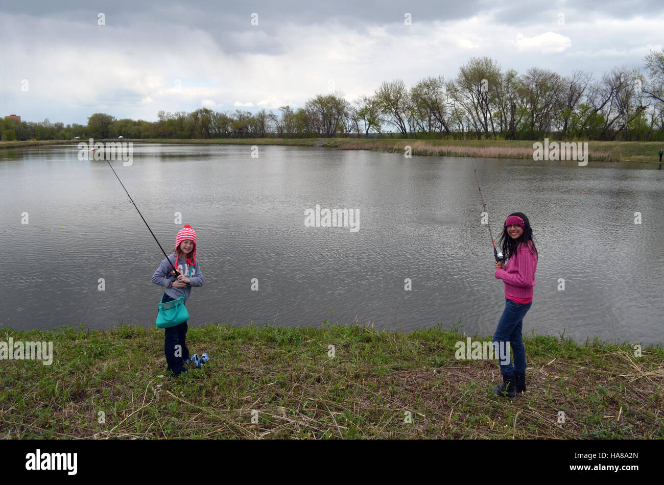 usfwsmidwest 14036050559 Girls pose while fishing Stock Photo - Alamy