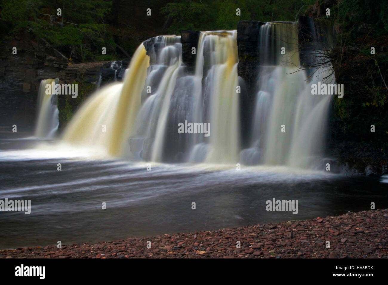Manabezho Falls on the Presque Isle River is a scenic waterfall located ...