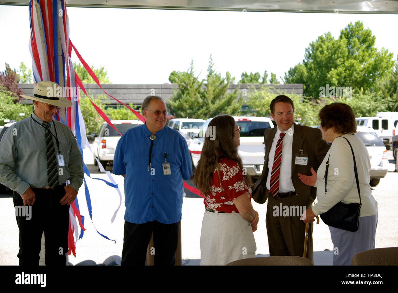 Visitors gather and interact in a national park, engaging with ...