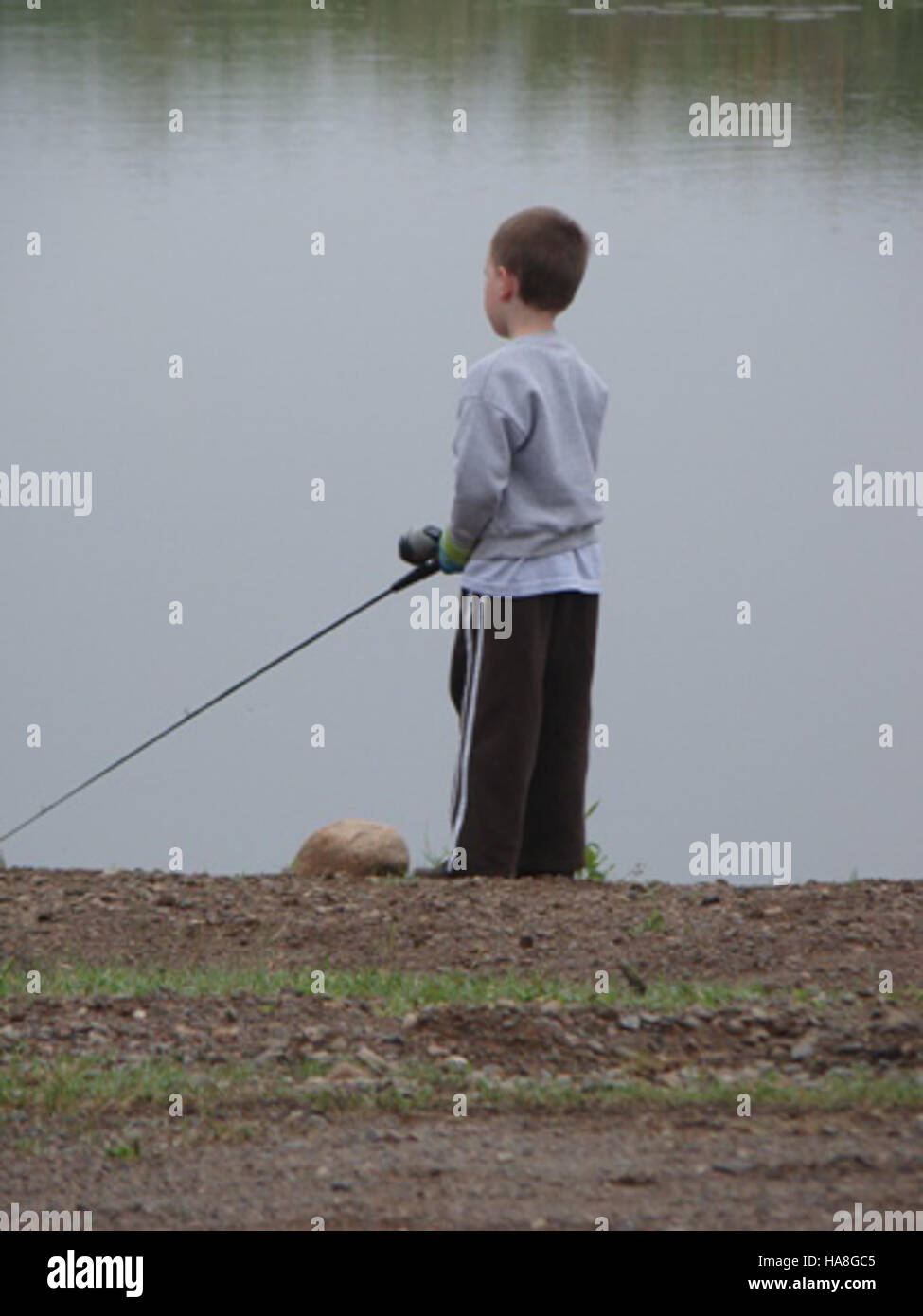 A family enjoys fishing in a national park, engaging with nature while ...