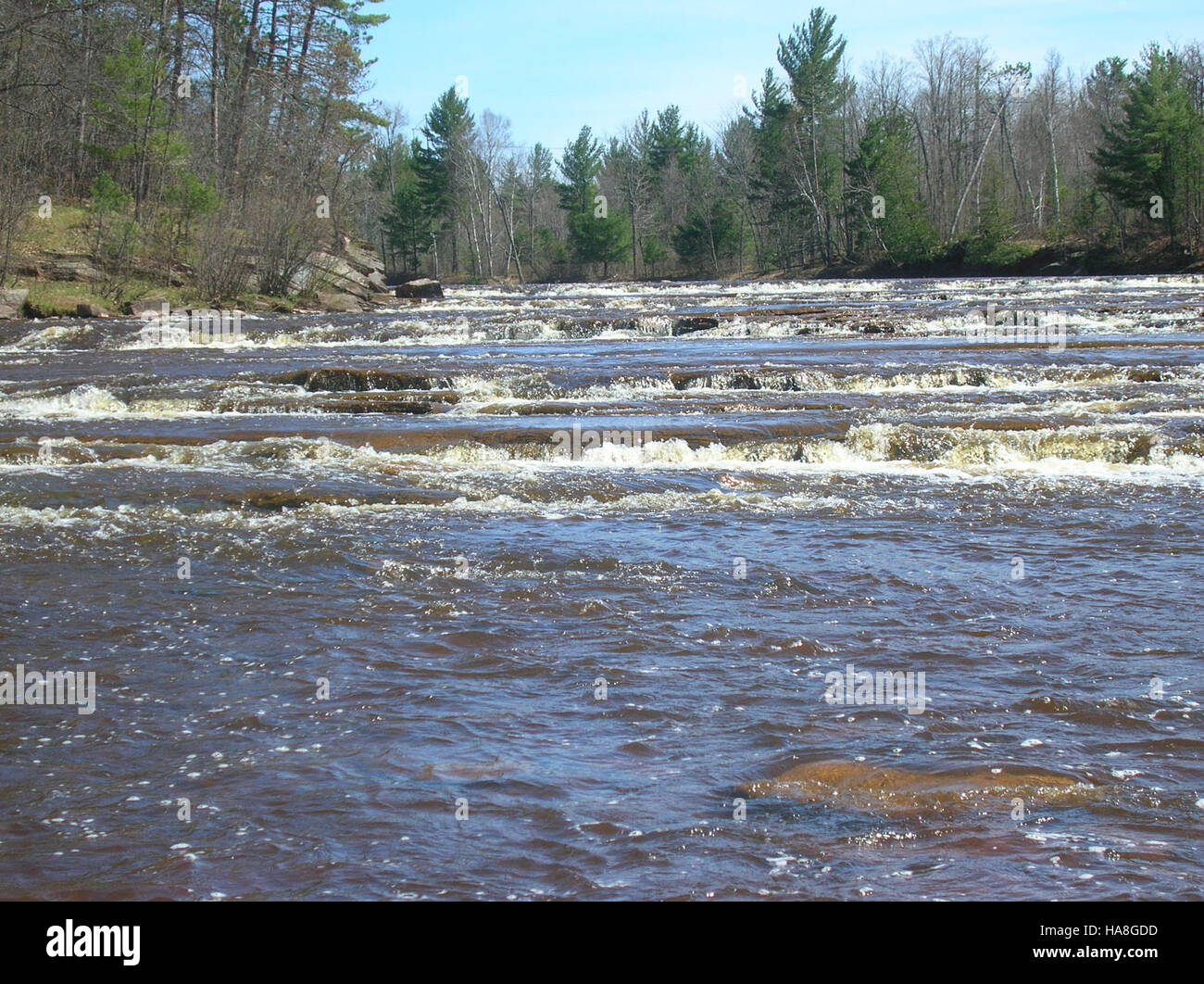 The Bad River Lower Falls, located in a national park in the Midwest ...