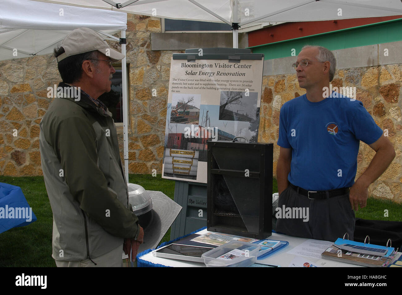 A volunteer at Booth National Park engages in environmental ...