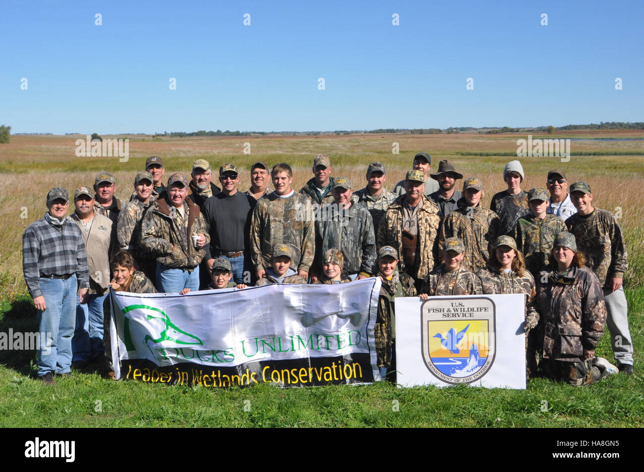 A group photo of wildlife conservationists and staff at a National Park ...