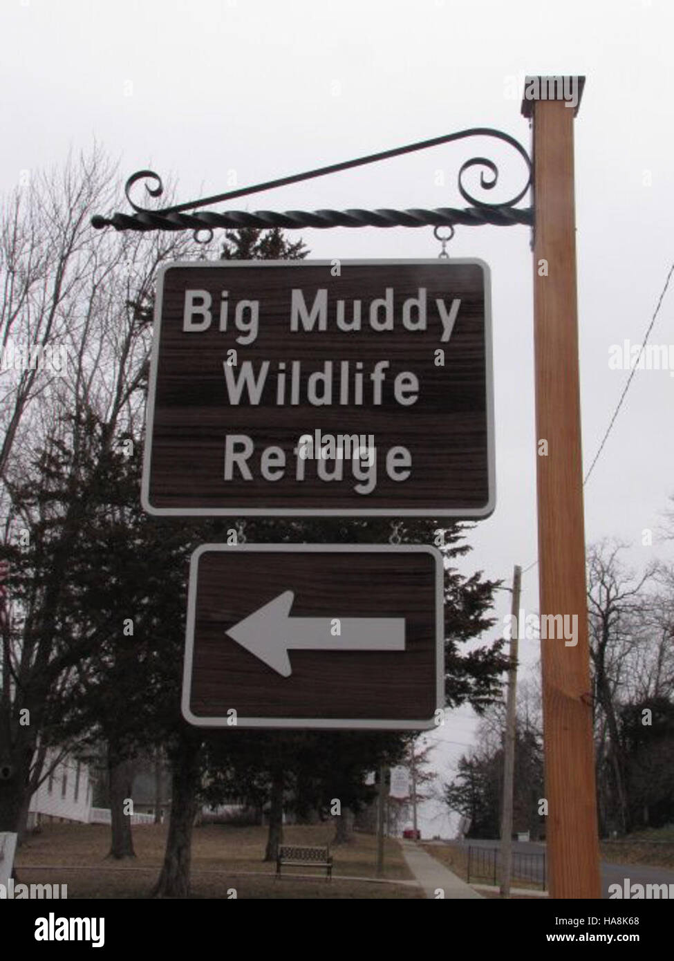 A newly installed directional sign in a national park, providing ...