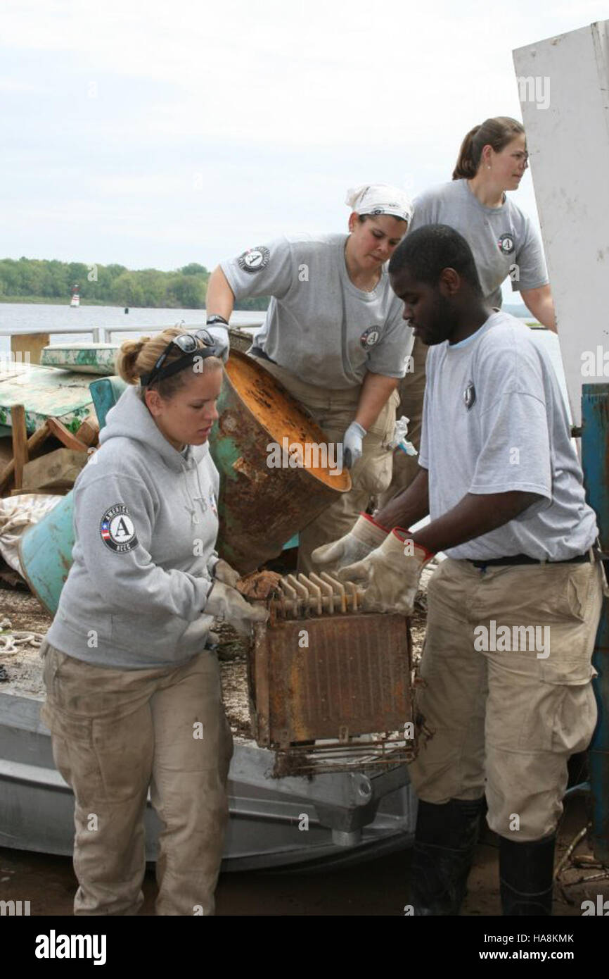A U.S. Fish and Wildlife Service crew unloads equipment from a pontoon ...