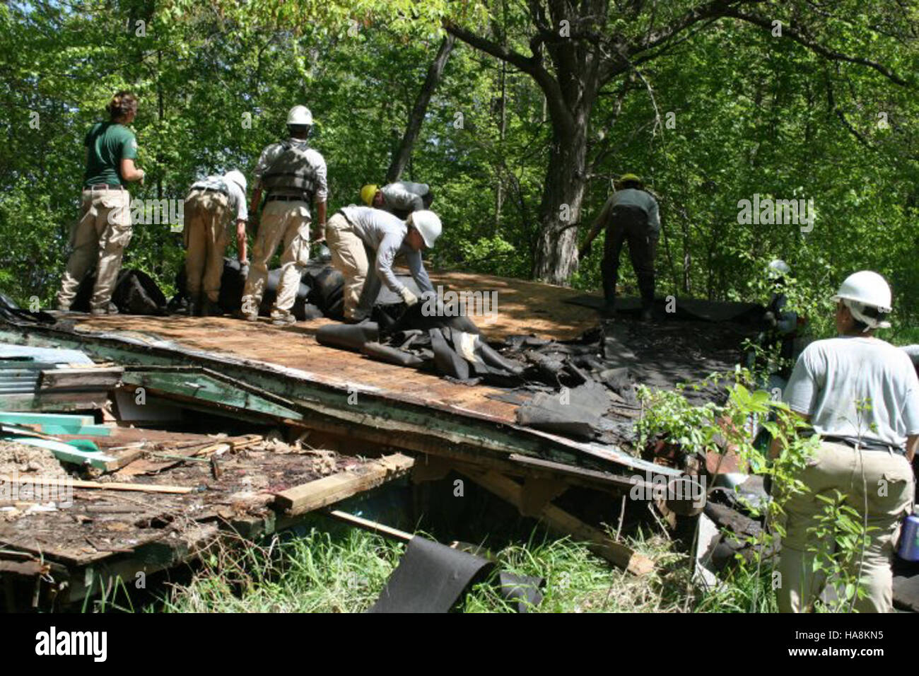 This image captures the process of roof removal at a national park, a ...