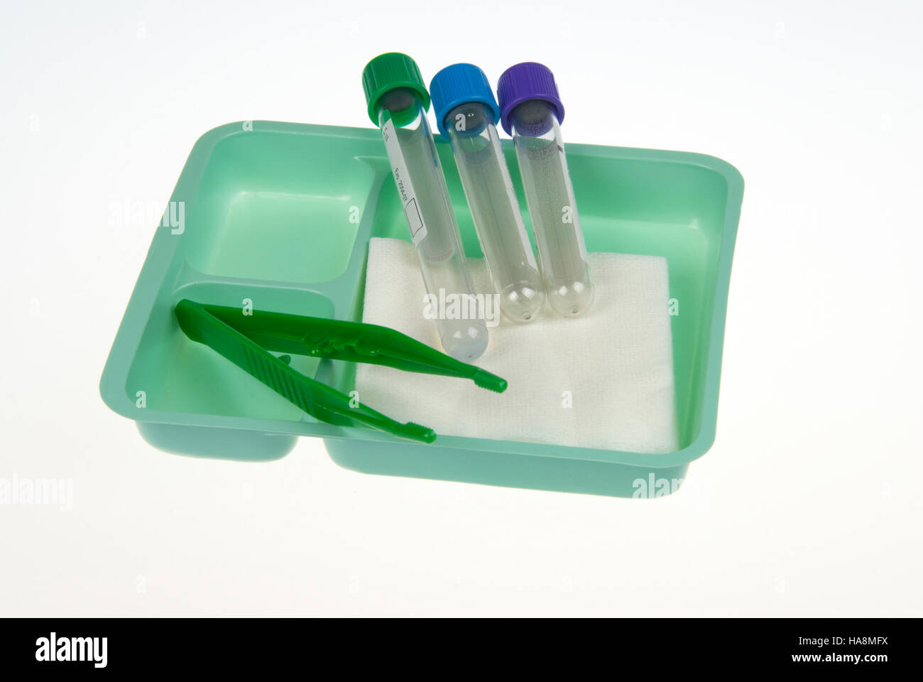 Medical Test Tubes and Tweezers on a Green Tray Stock Photo - Alamy