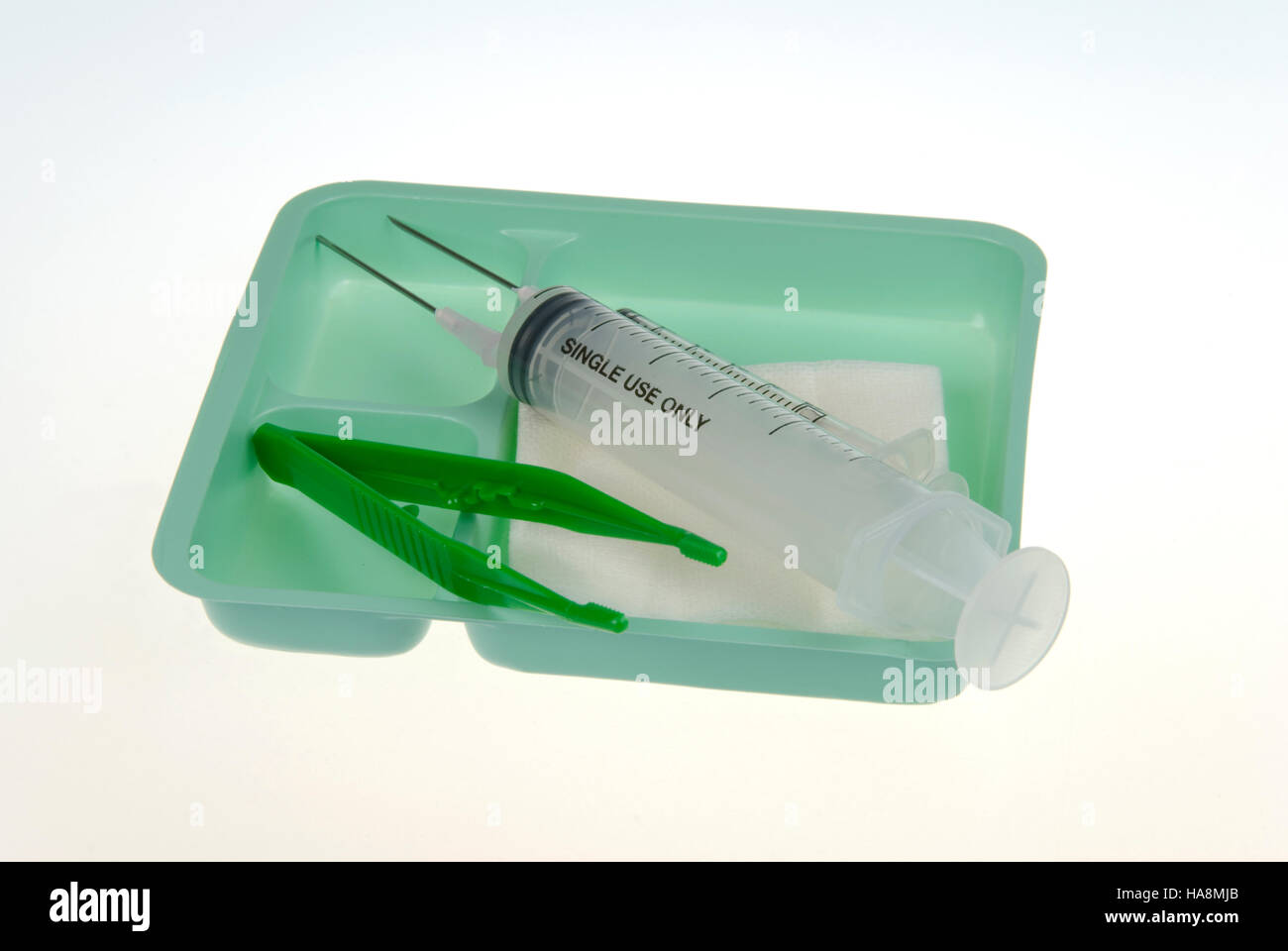 Medical Tray with Syringes and Tweezers Stock Photo - Alamy