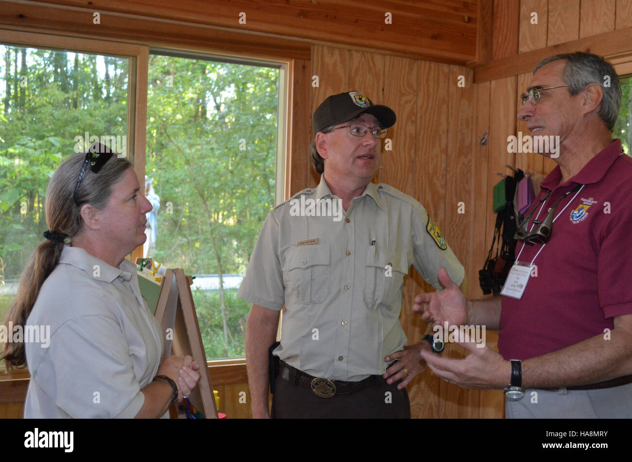 A photo showing Refuge Manager RD and staff from a national park or ...