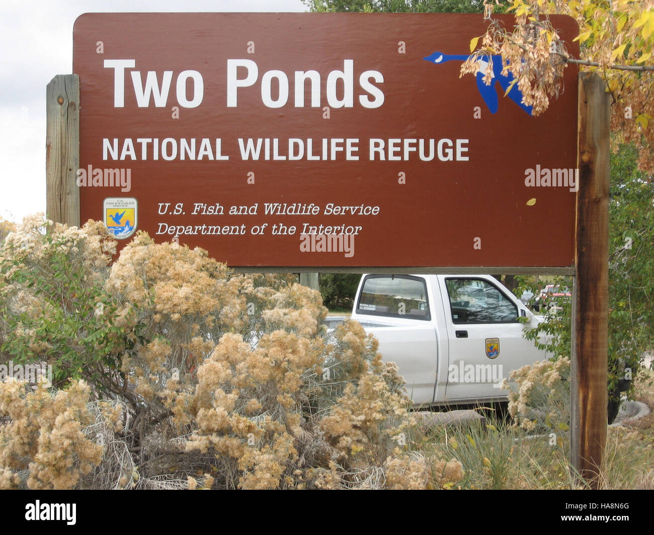 An image of a sign and truck at Two Ponds National Wildlife Refuge ...