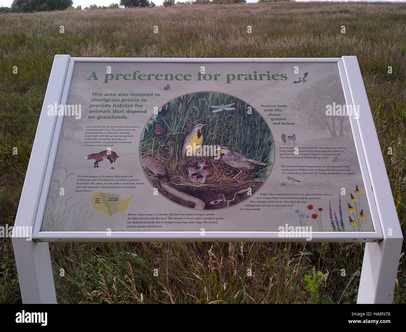 A sign at the Prairie Ecosystems National Park educates visitors on the ...