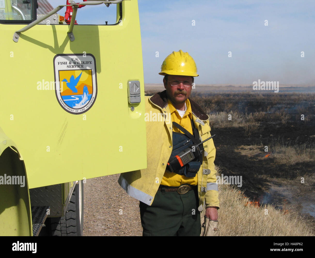 A prescribed fire is conducted in a national park to manage ecosystems ...