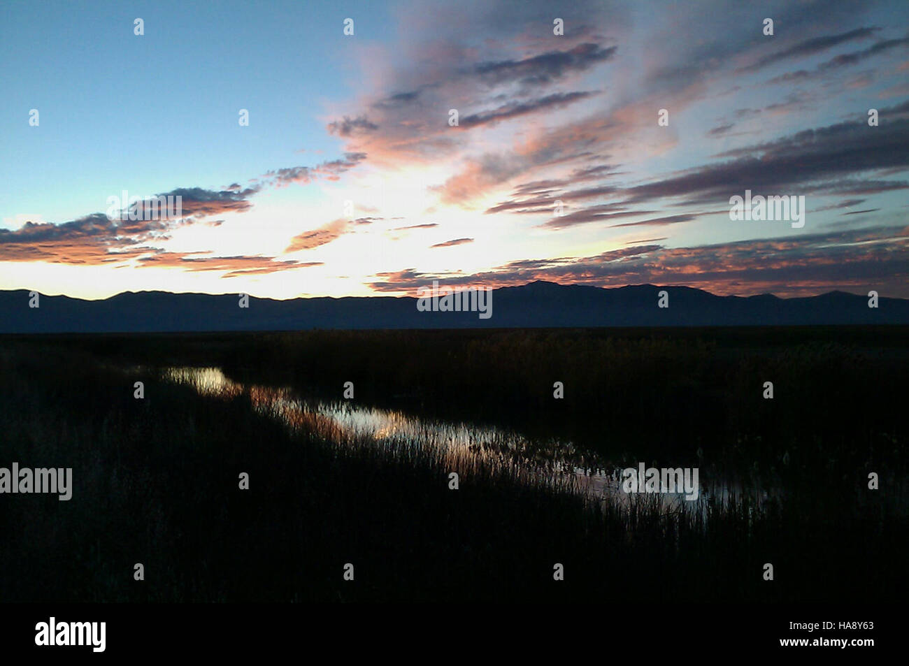 Stunning sunsets over the Mountain Prairie National Park provide scenic ...