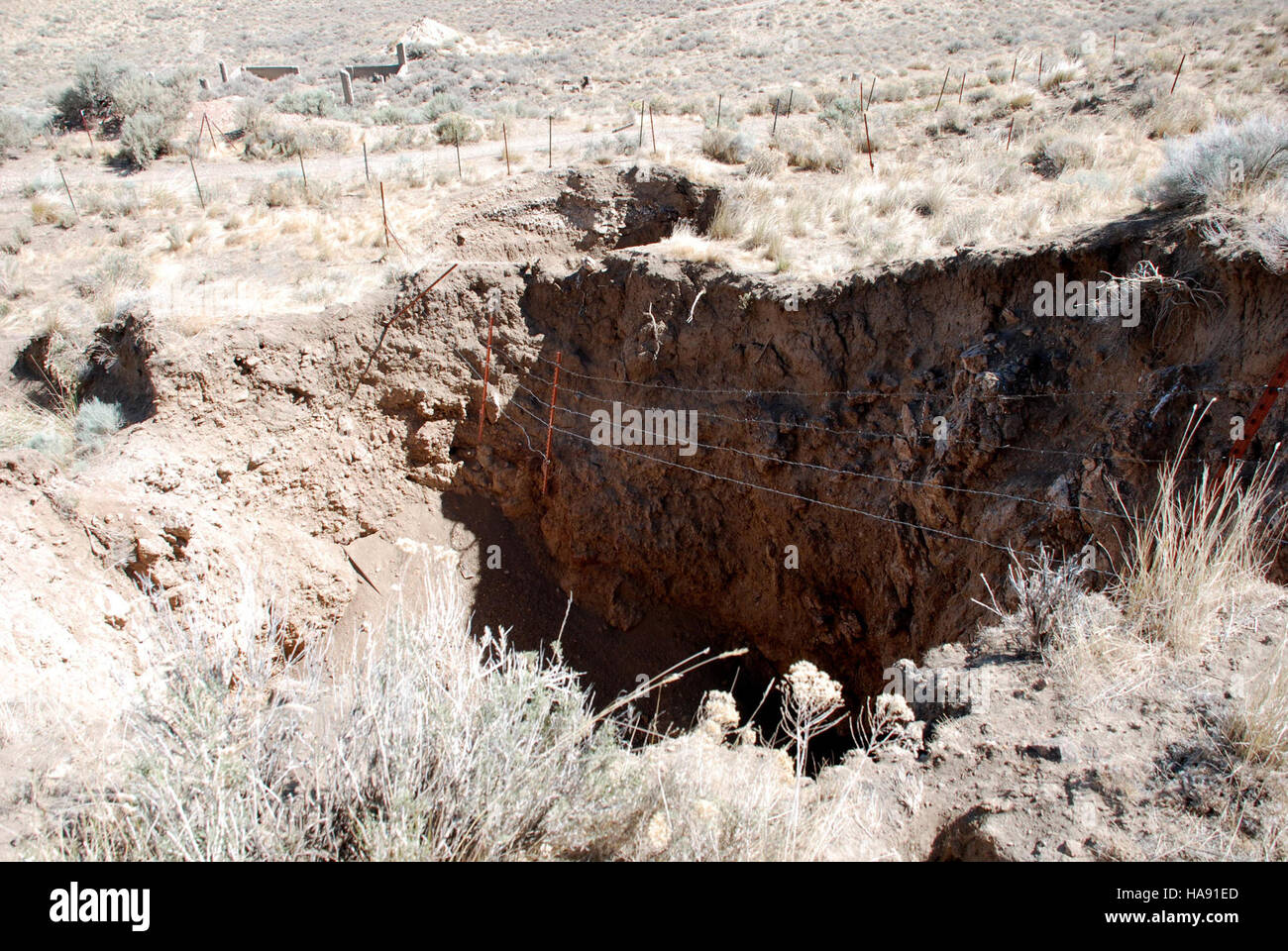 A seemingly purposeless fence in a remote area of Nevada’s public lands ...