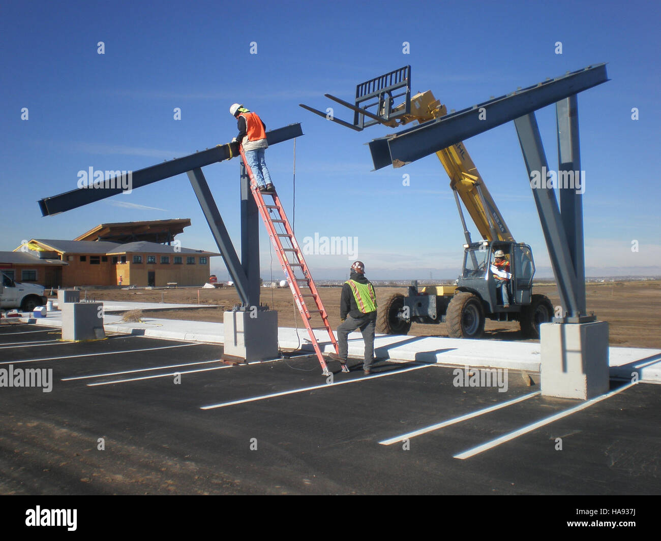 This image shows the installation of photovoltaic panels at the Rocky ...