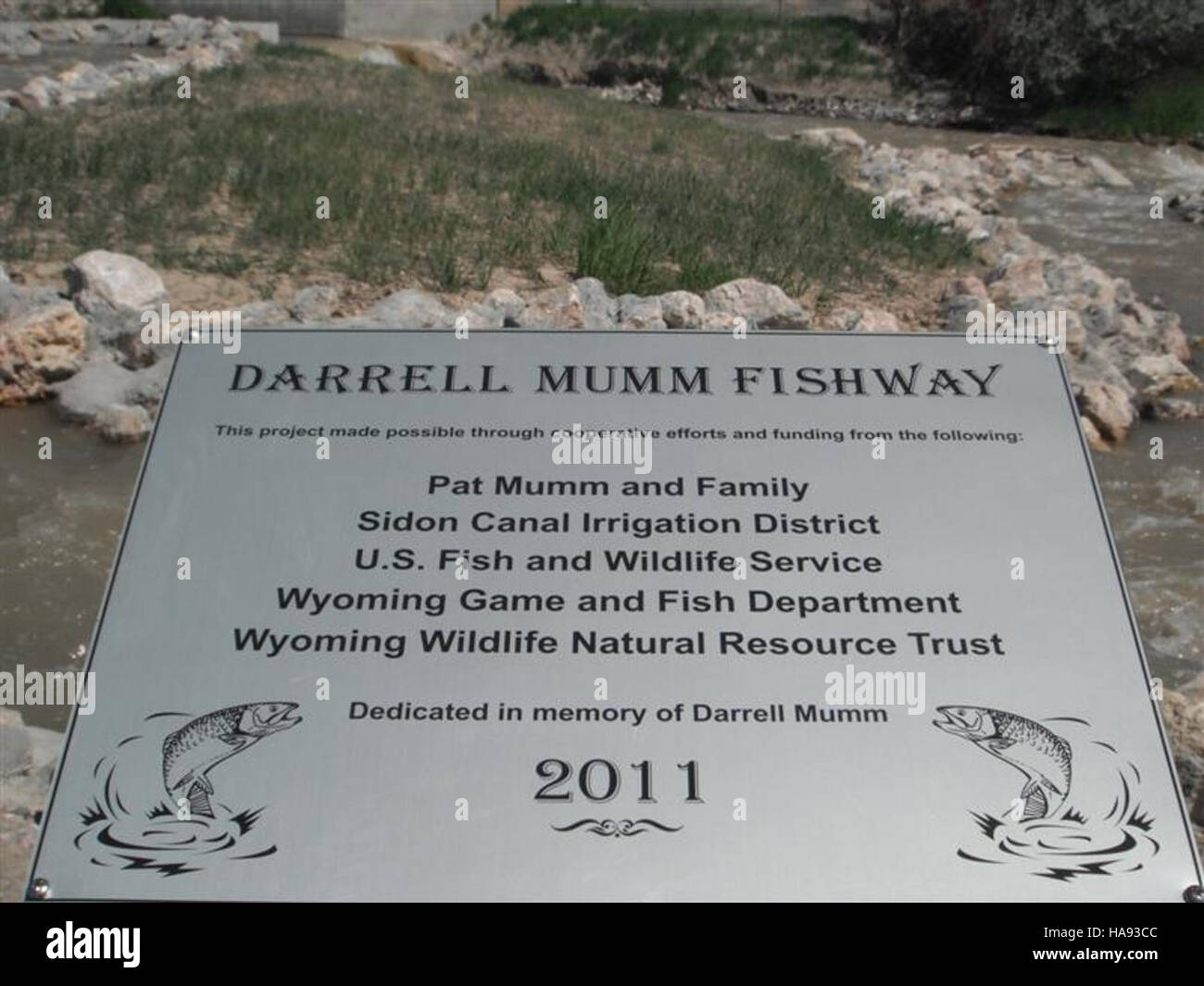 A dedication sign commemorating the preservation and importance of a ...