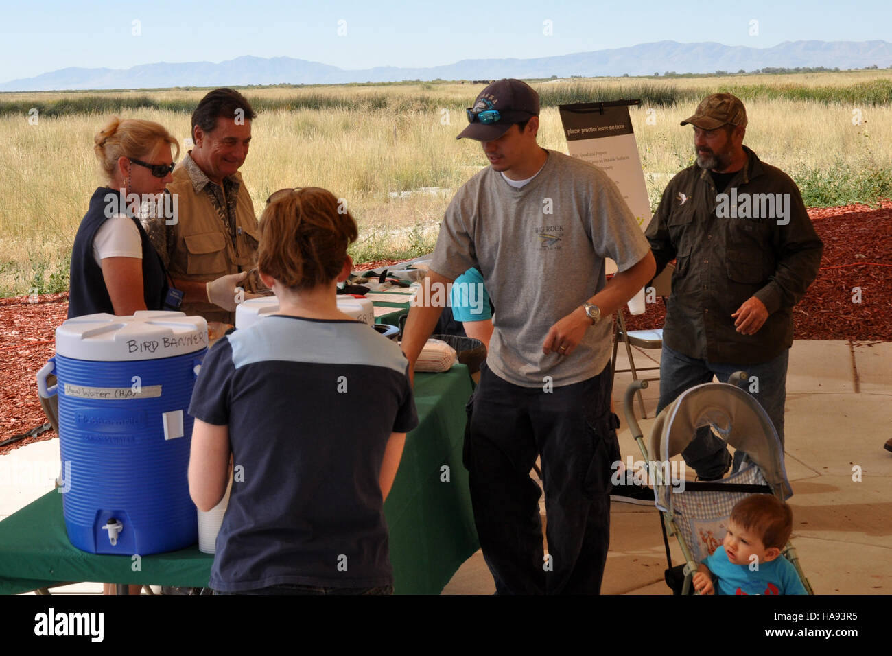 Visitors to a national park enjoy refreshments, highlighting the ...