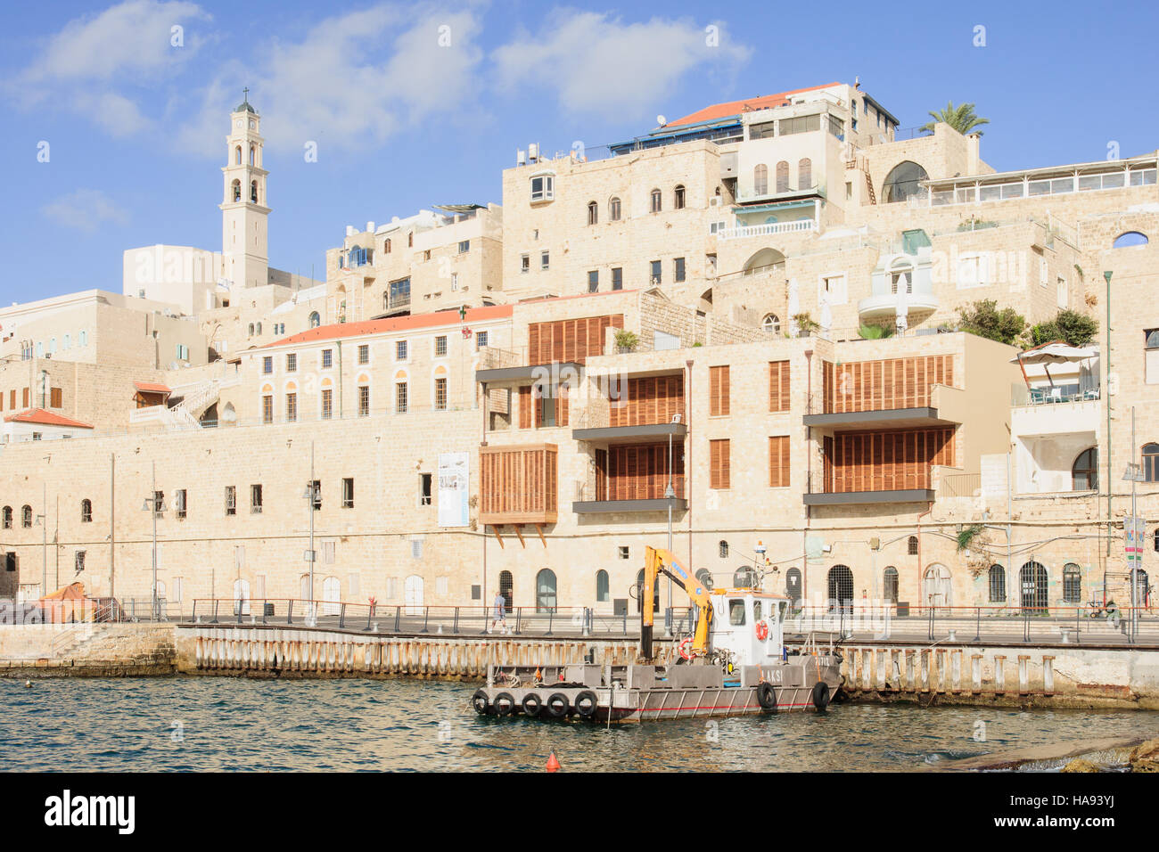 TEL-AVIV - JULY 13, 2014: Boats and church tower in the old Jaffa Port ...