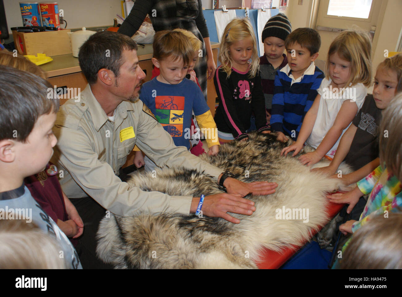 The image highlights the Scientists in the Community program, a ...