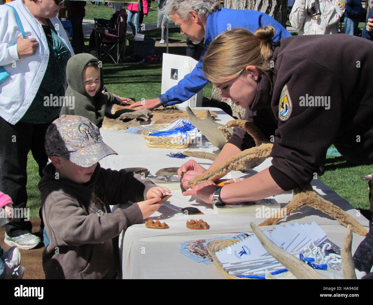 An education booth in a national park's town square offers resources ...