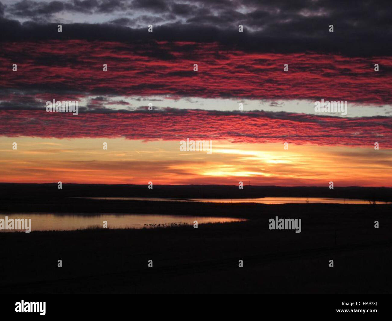A serene sunrise at Chase Lake National Wildlife Refuge (NWR) in North ...