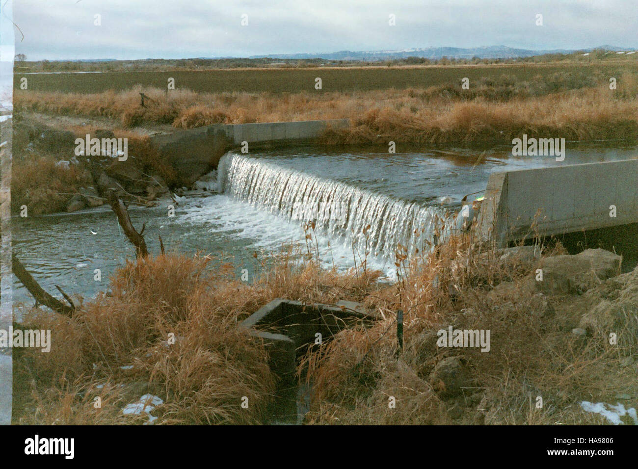 The image illustrates the engineering challenge of an irrigation canal ...