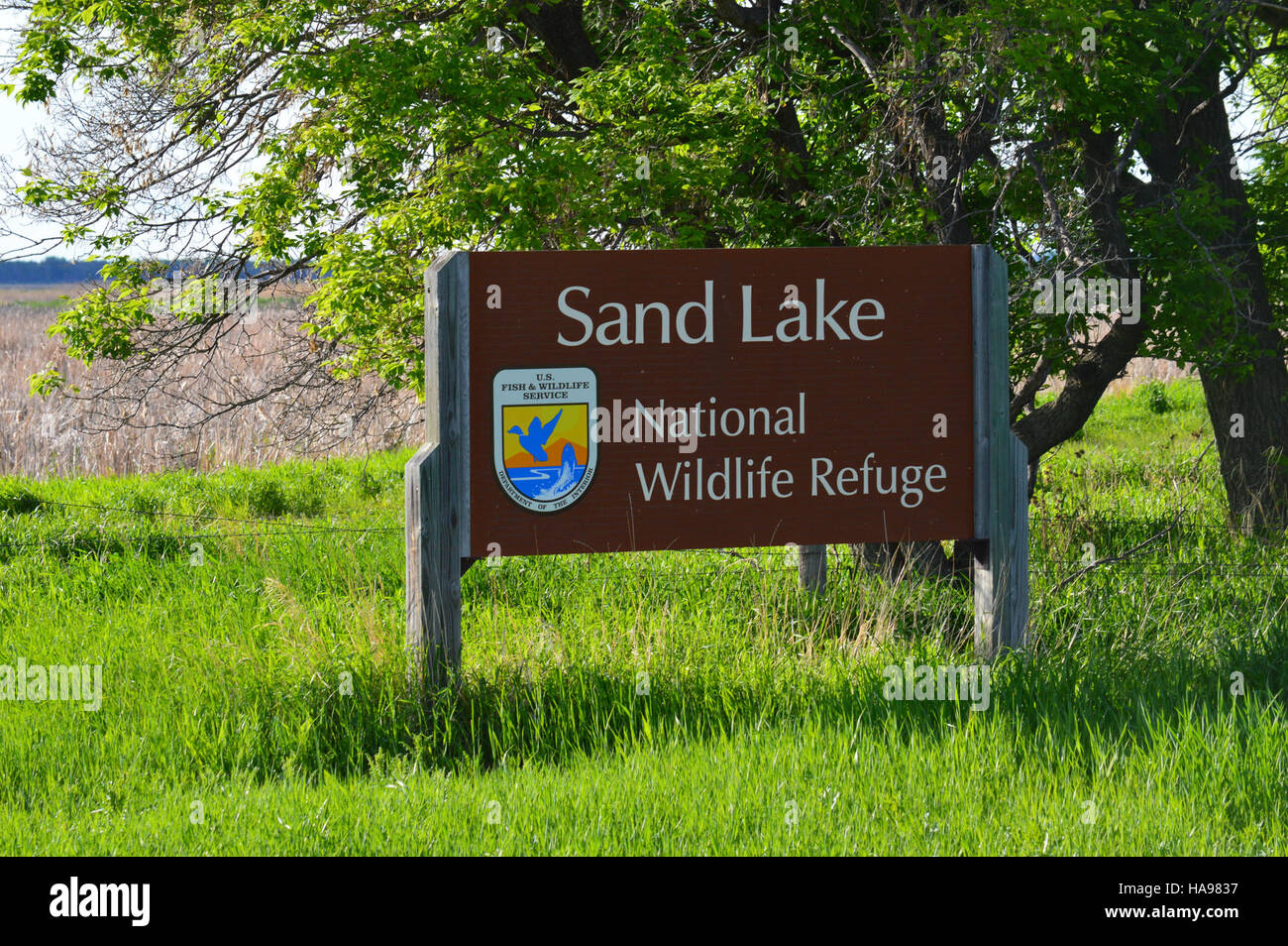 The sign at Sand Lake National Wildlife Refuge (NWR) marks the entrance ...