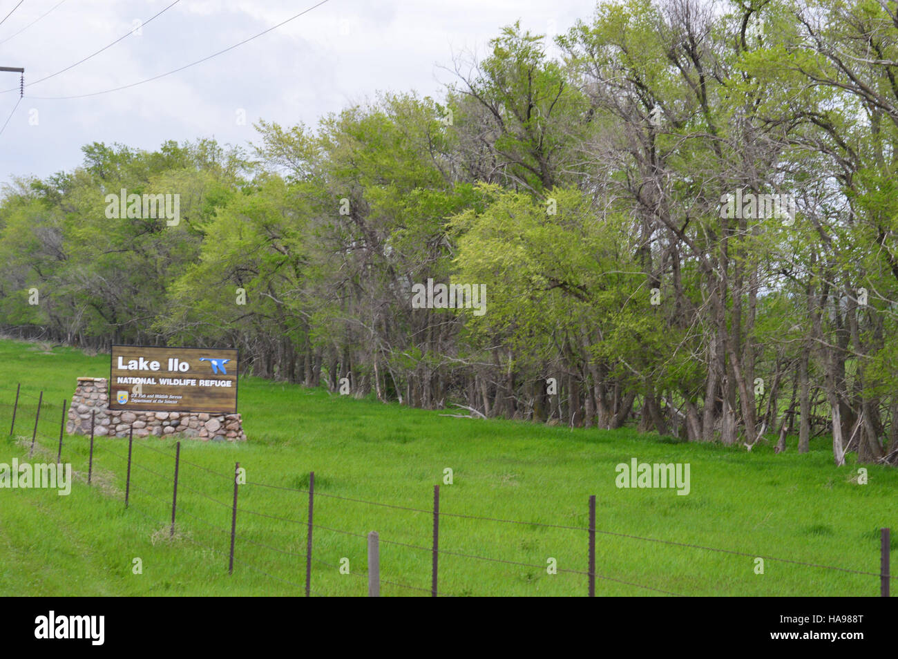 A sign at Lake Ilo National Wildlife Refuge serves as a marker for both ...