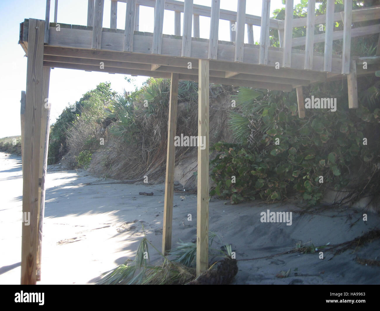 The image depicts a damaged crossover bridge at the Archie Carr ...