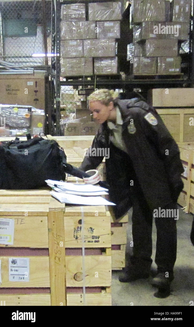 This image depicts a federal wildlife management office organizing ...