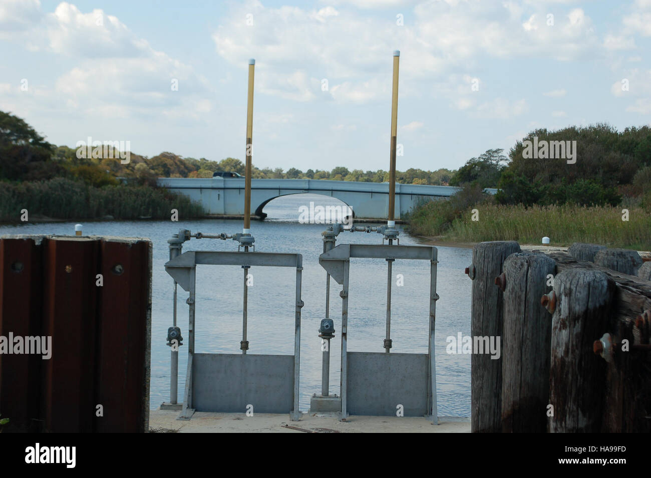 The image highlights an existing culvert sluice gate in a National Park ...
