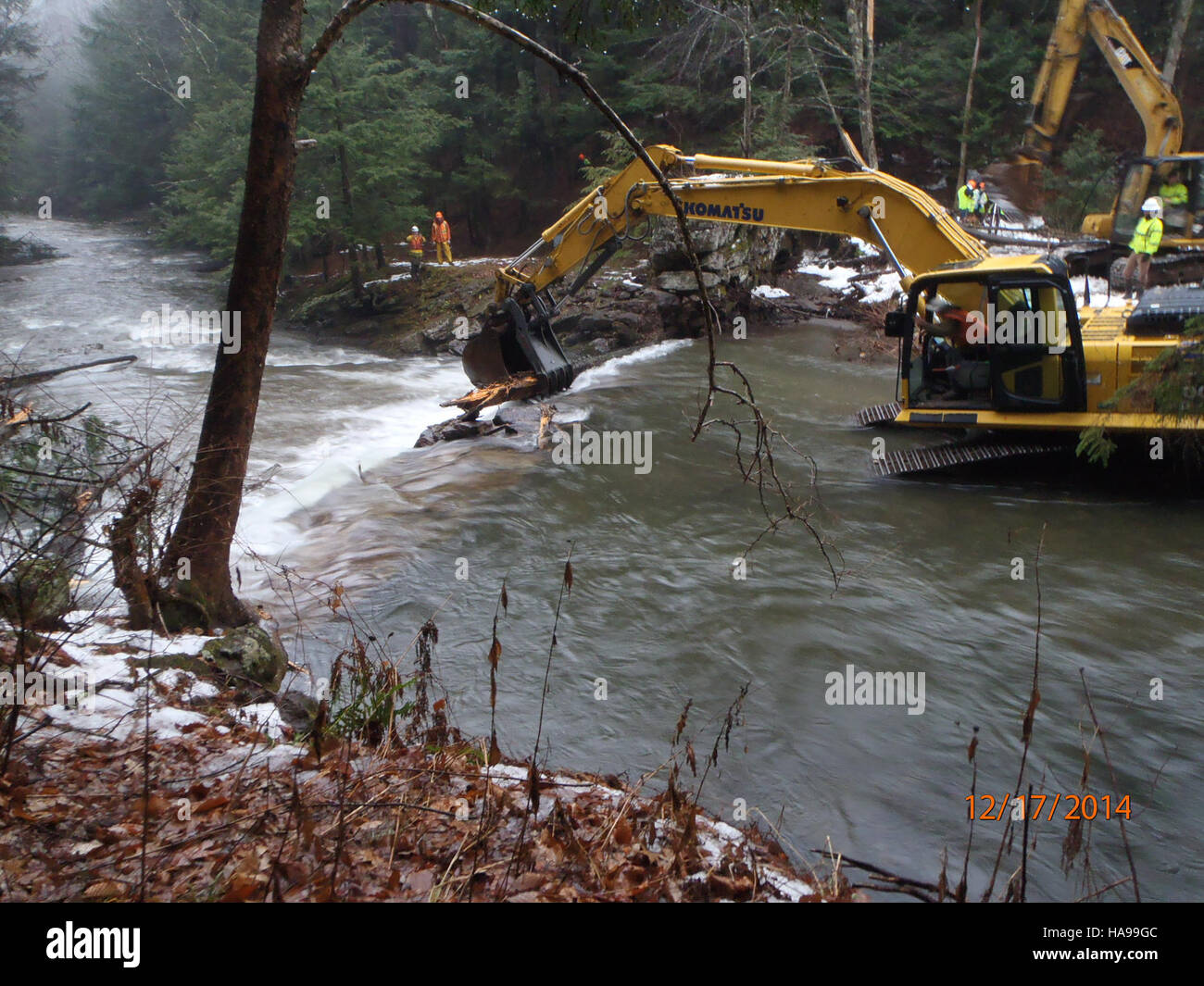 This image shows the removal of a spillway at Fall River Dam within a ...