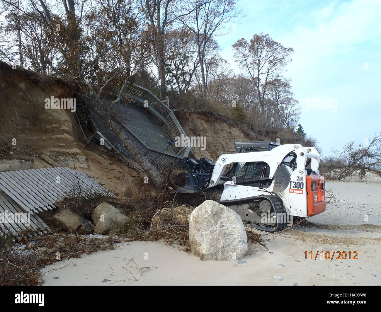 A team works to remove a destroyed platform at Target Rock National ...