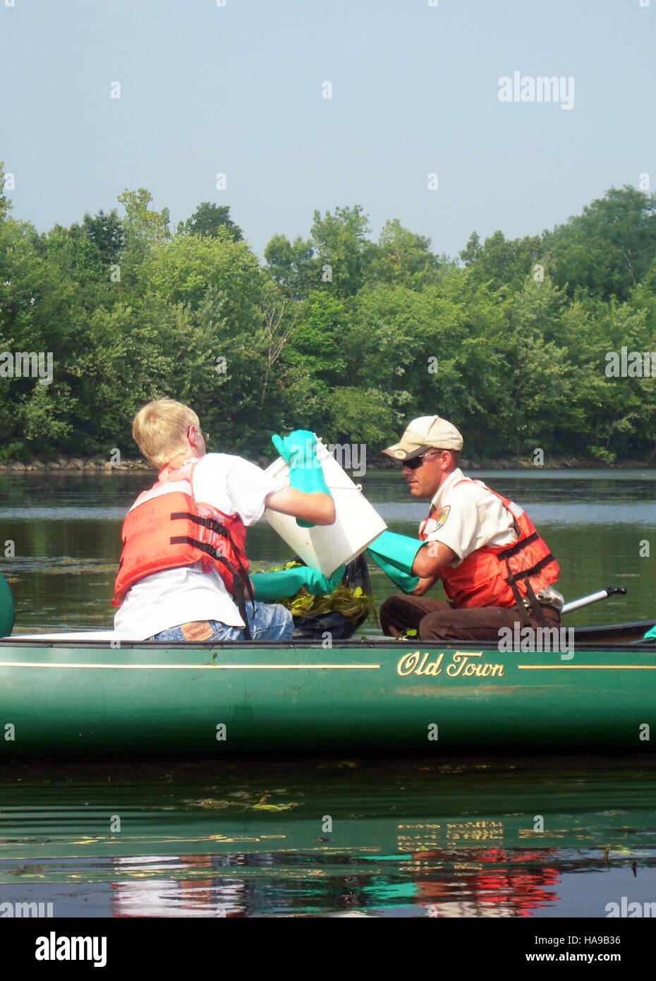 The Youth Conservation Corps (YCC) crew works to remove invasive water ...
