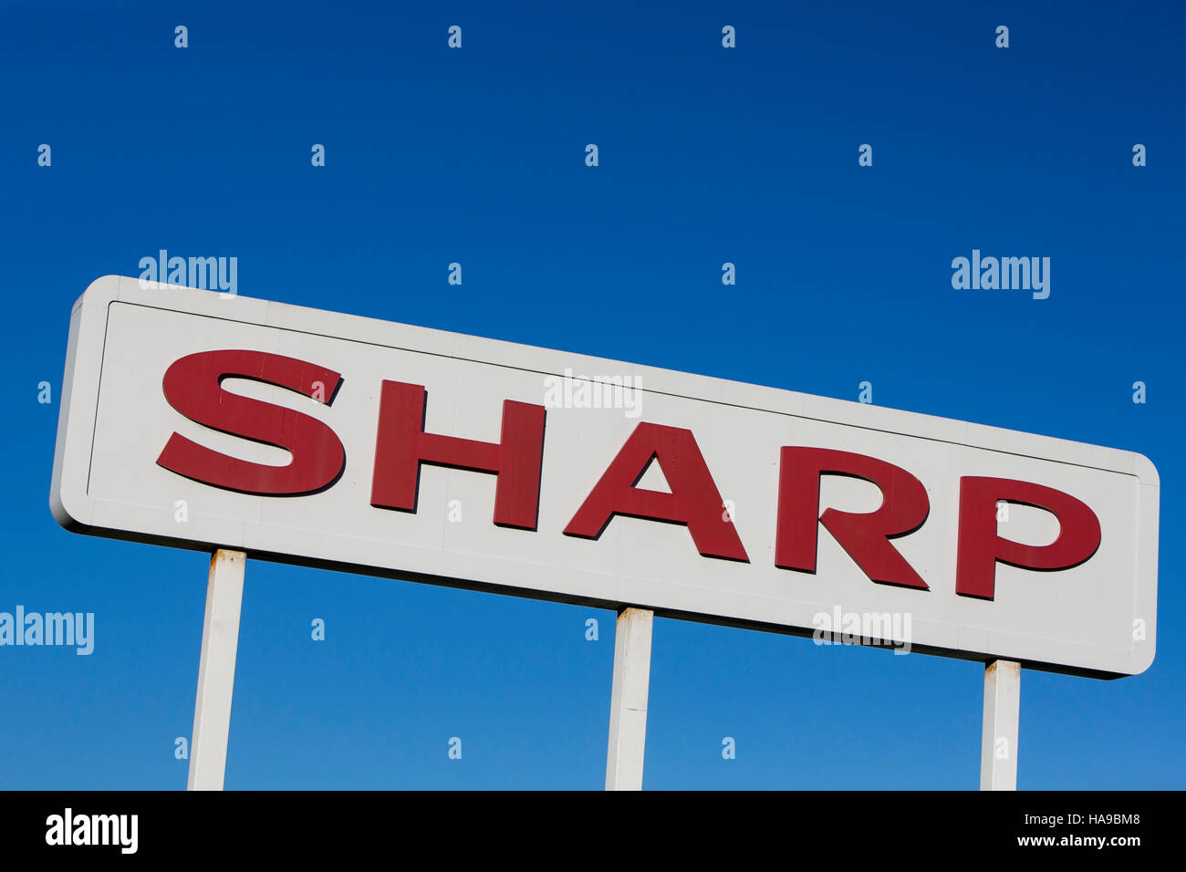 A logo sign outside of a facility occupied by the Sharp Corporation in ...