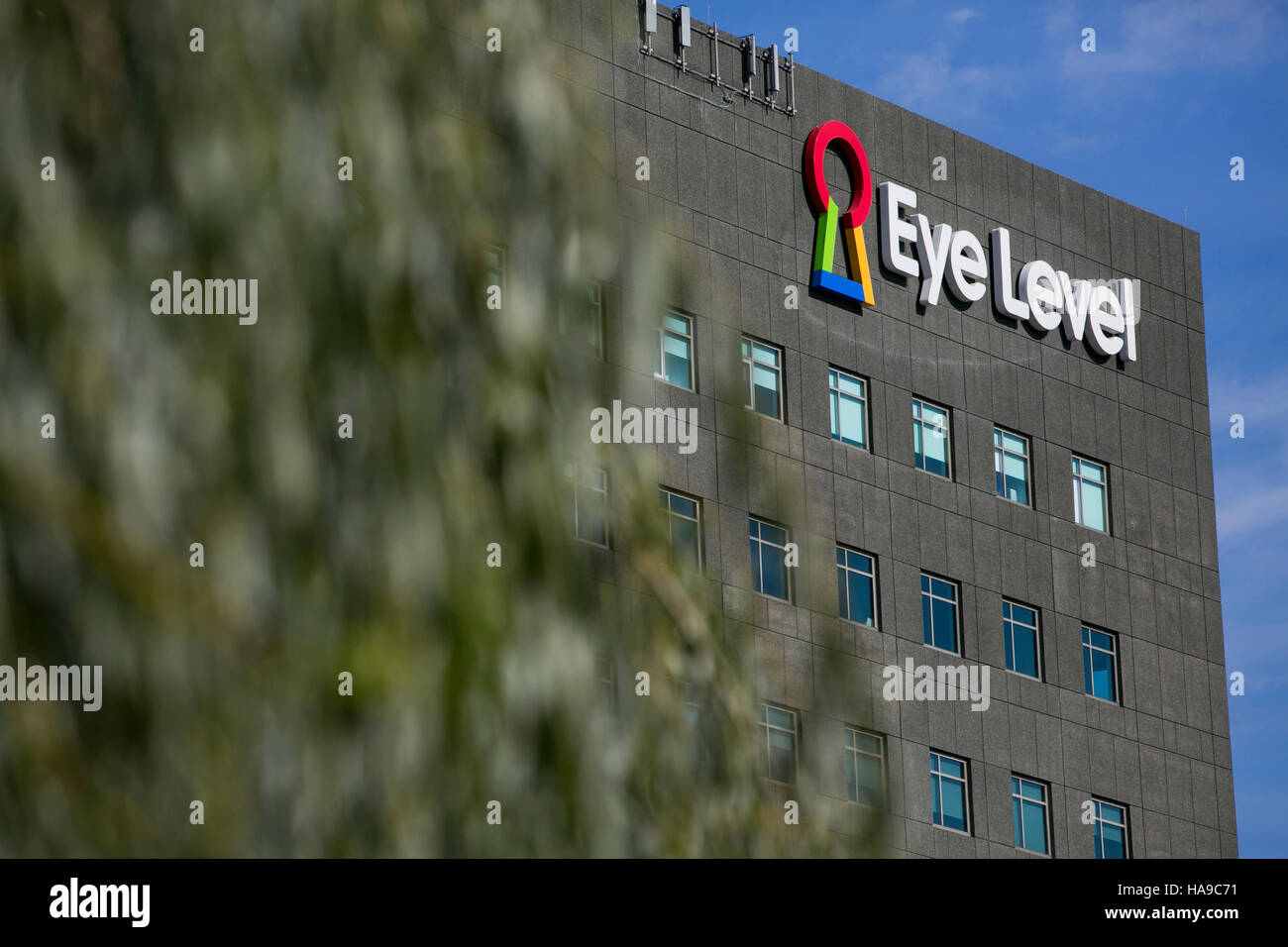 A logo sign outside of a facility occupied by Eye Level Learning in ...