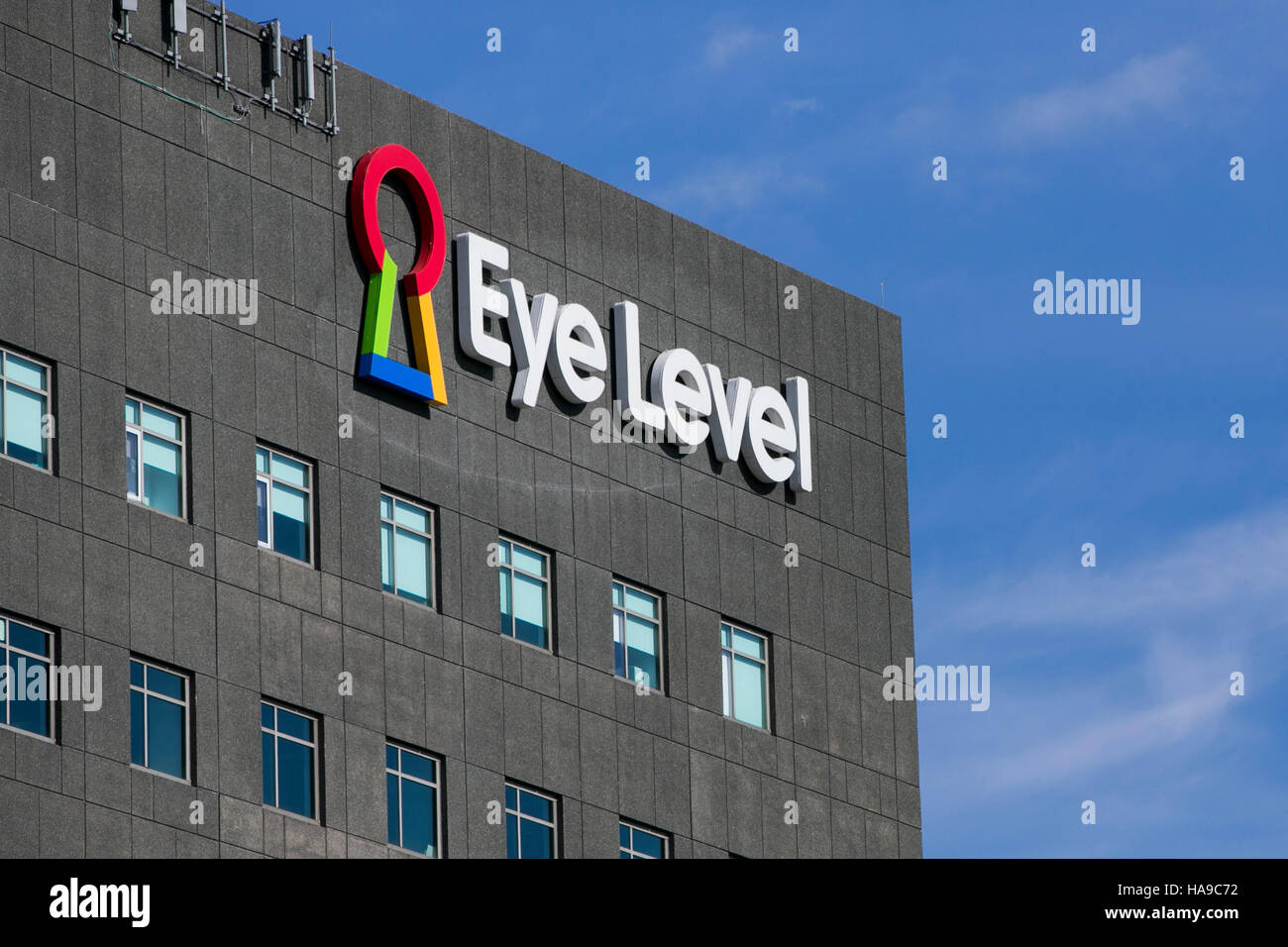 A logo sign outside of a facility occupied by Eye Level Learning in ...