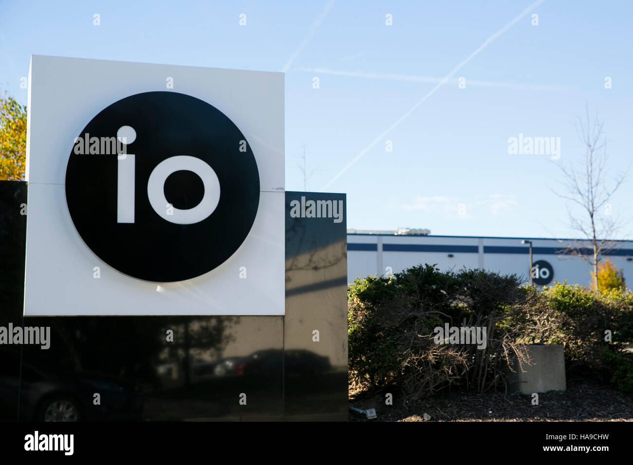 A logo sign outside of a facility occupied by IO Data Centers in Edison ...