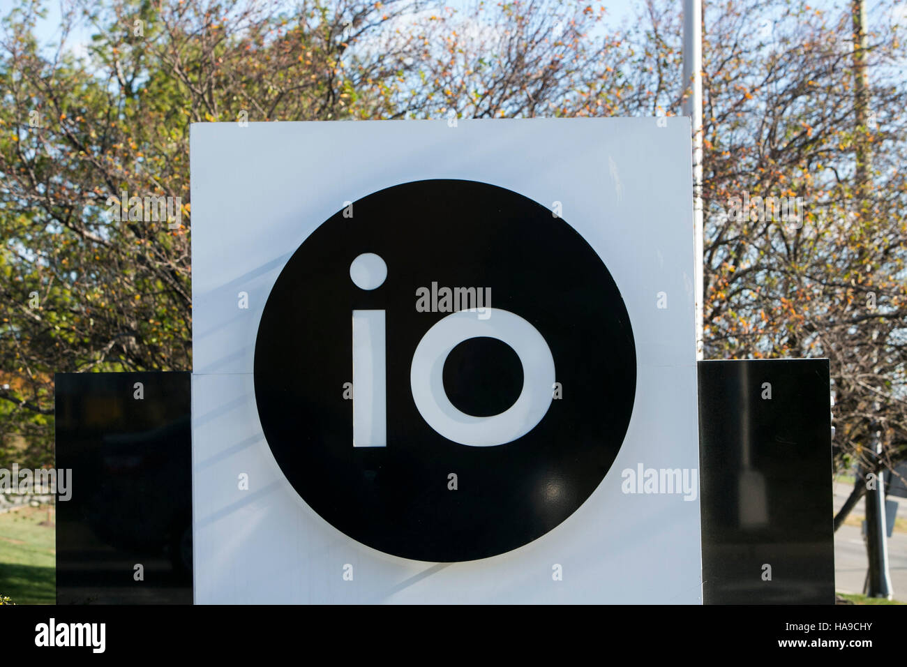 A logo sign outside of a facility occupied by IO Data Centers in Edison ...