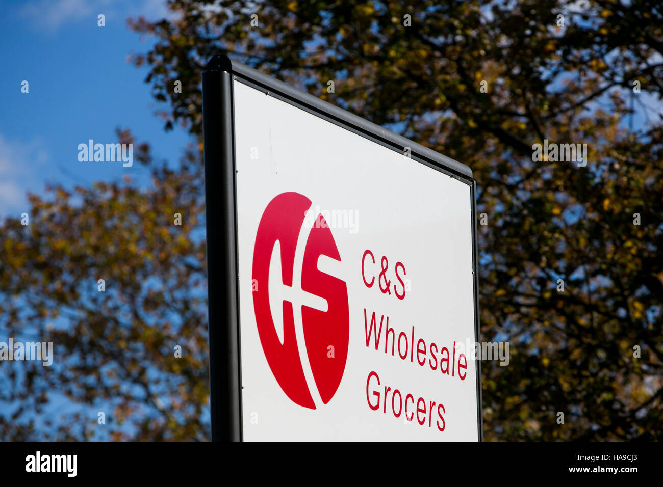 A logo sign outside of a facility occupied by C&S Wholesale Grocers in ...