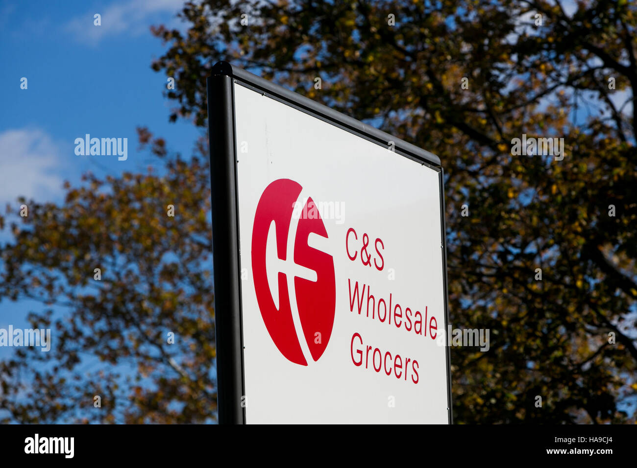A logo sign outside of a facility occupied by C&S Wholesale Grocers in ...