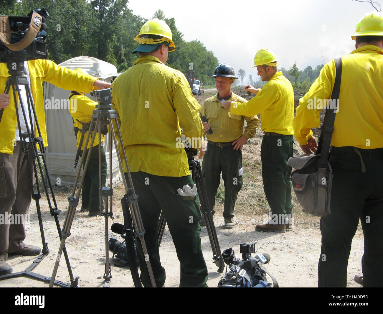 A firefighter prepares for action while mic'd up during an operation at ...