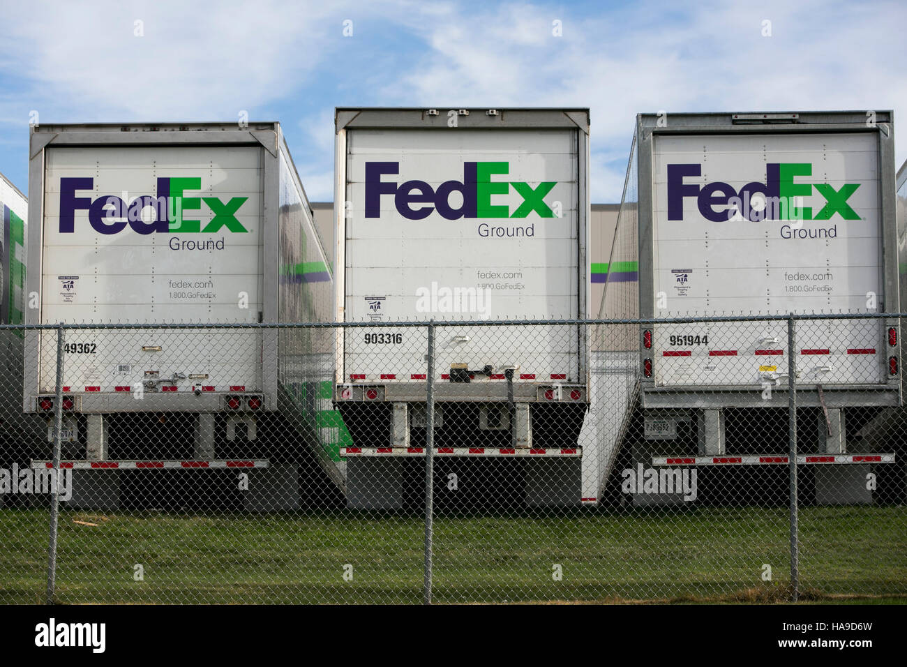 FedEx Ground logos on truck trailers lined up at a facility in Dayton ...