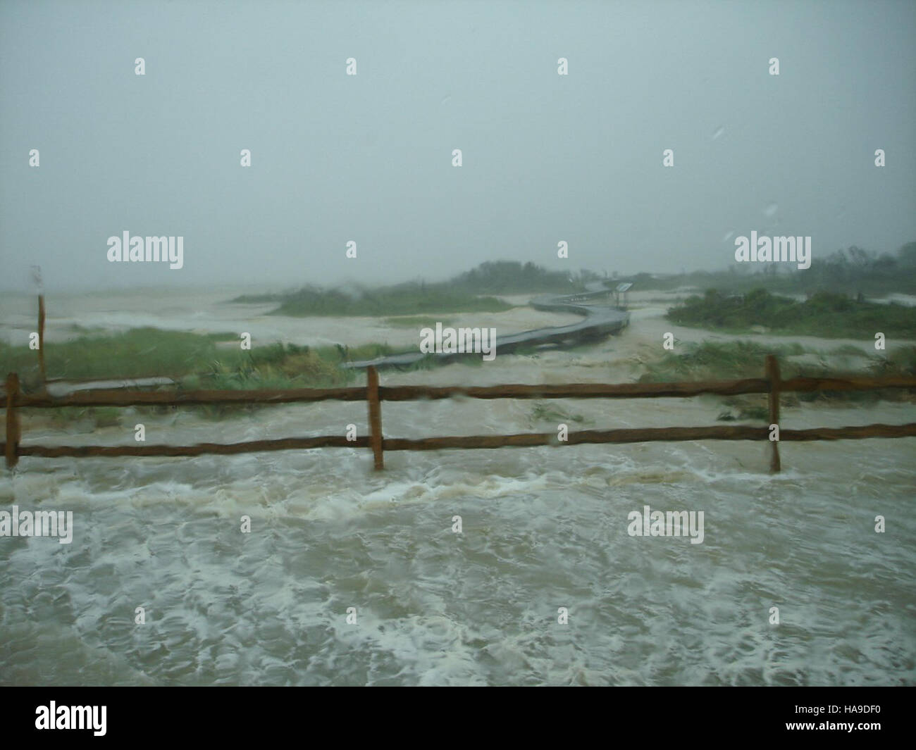 A flooded boardwalk near Toms Cove Visitor Center in a national park ...