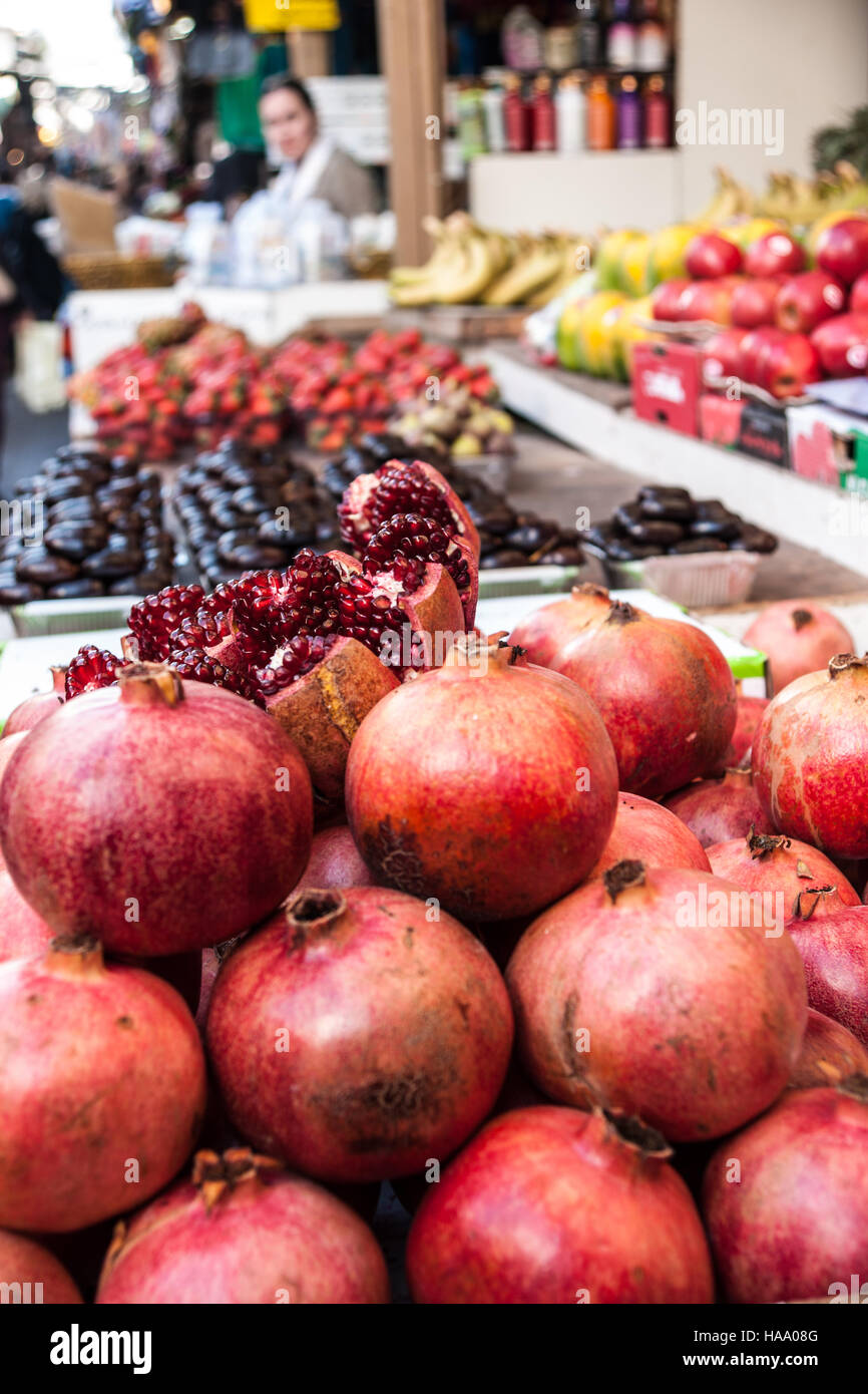 TEL-AVIV, ISRAEL - JAN 17, 2014: Pomegranates on sale in the Carmel ...