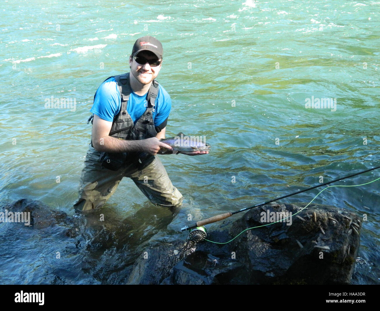 Anglers fish for rainbow trout in Oregon's Rogue River, a popular ...