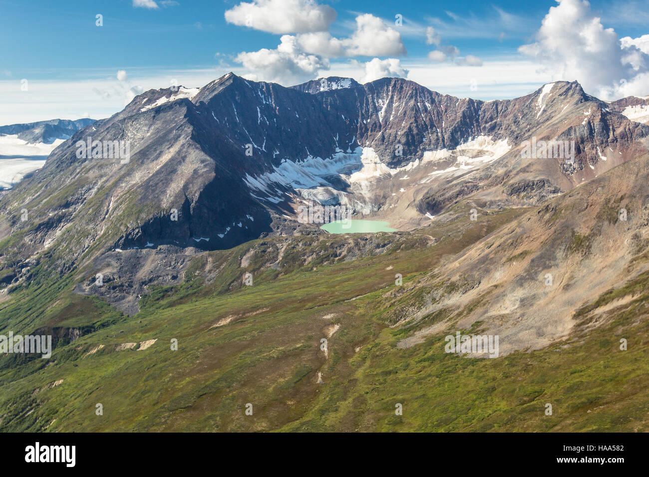 Granite Creek Tarn, located in a national park in Alaska, is a pristine ...