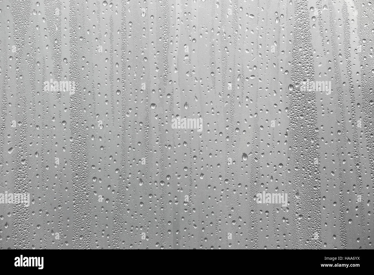 Closeup water condensation on window glass background Stock Photo - Alamy