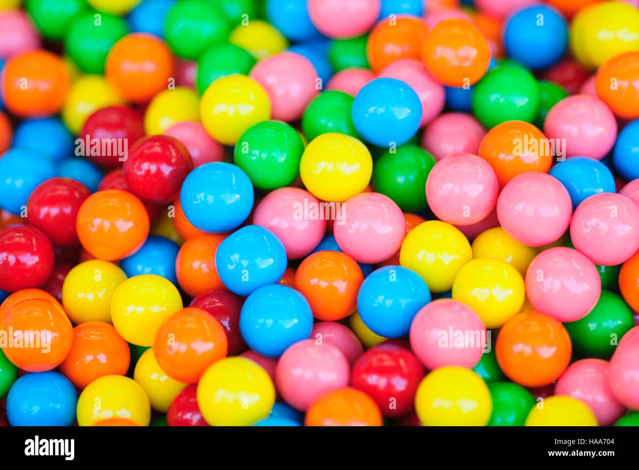 Sweet candies in multiple colors Stock Photo - Alamy
