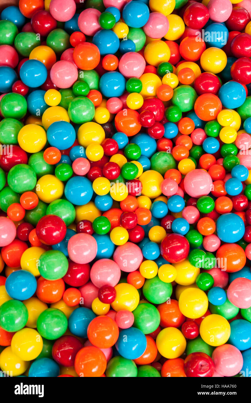 Sweet candies in multiple colors Stock Photo - Alamy